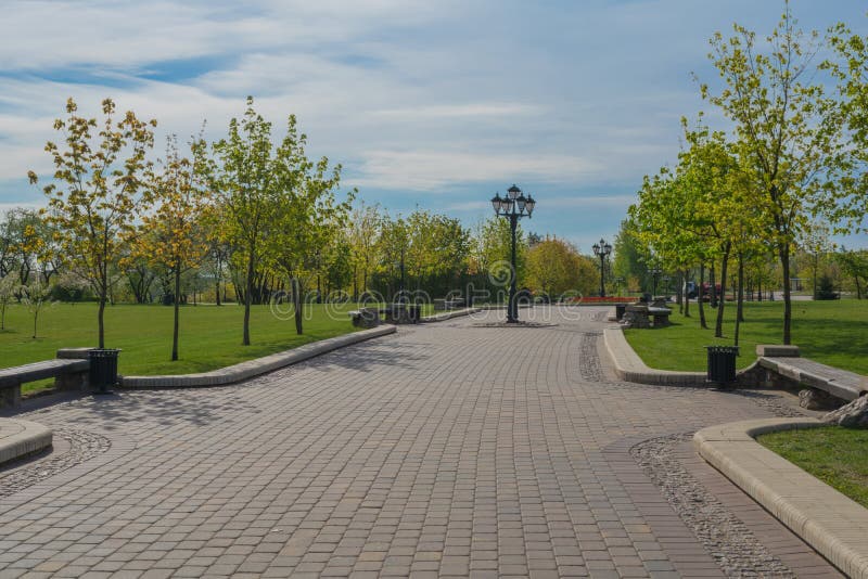 Tracks in Spring Park Landscape Against Blue Sky Stock Photo - Image of ...