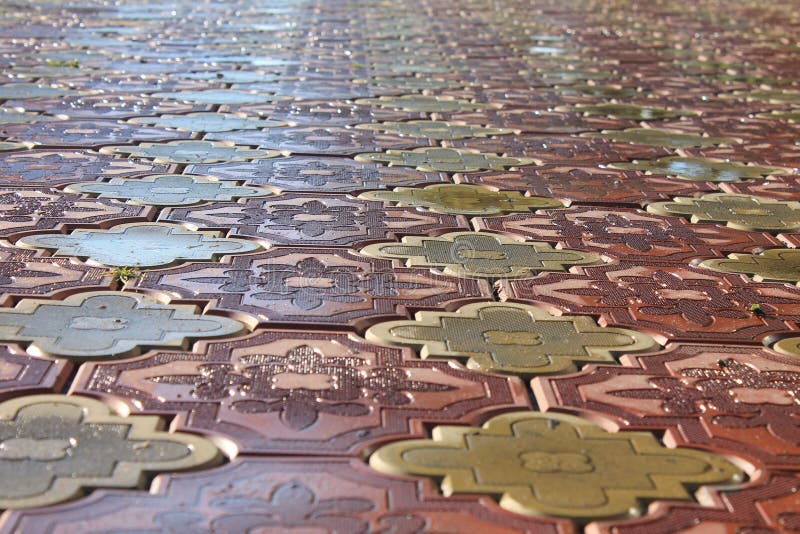Tracks from tiles stock photo. Image of path, alley, pavers - 76410514