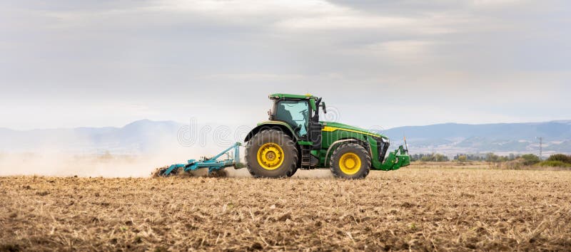 Panoramic View of a Tractor Plowing Editorial Image - Image of country ...