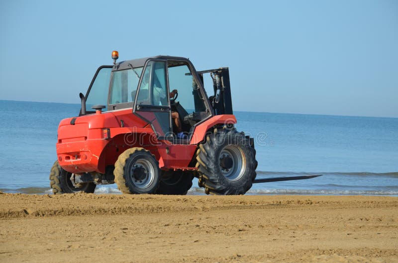 Beach Cleaner Tractor stock image. Image of tracks, bucket - 28303459