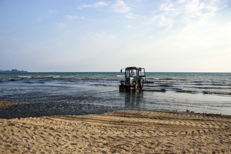 Tractor on the beach stock photo. Image of sand, outdoors - 145161182