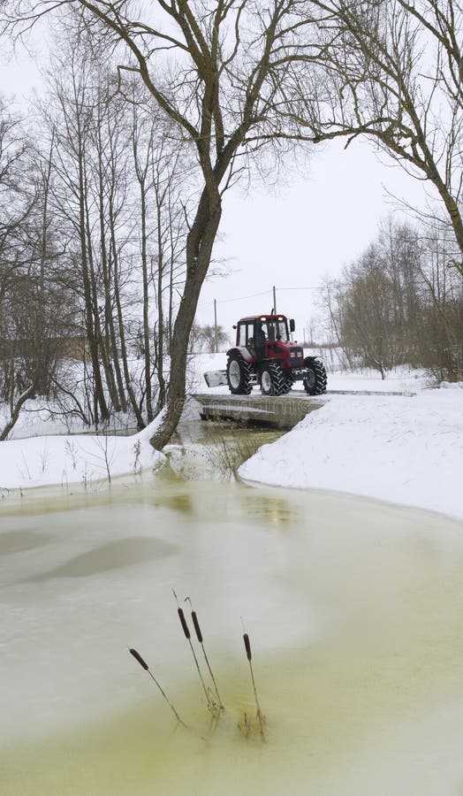 Tractor on the bridge. stock image. Image of turning - 13273557