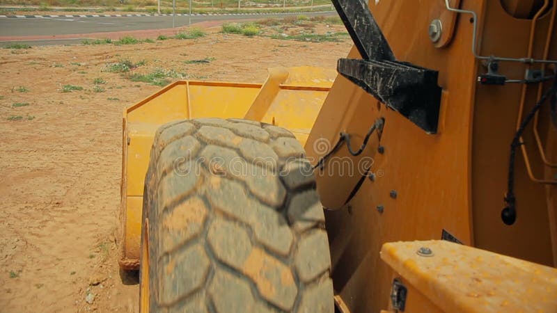 Tractor with a Bulldozer Moving Soil at a Construction Site Stock ...
