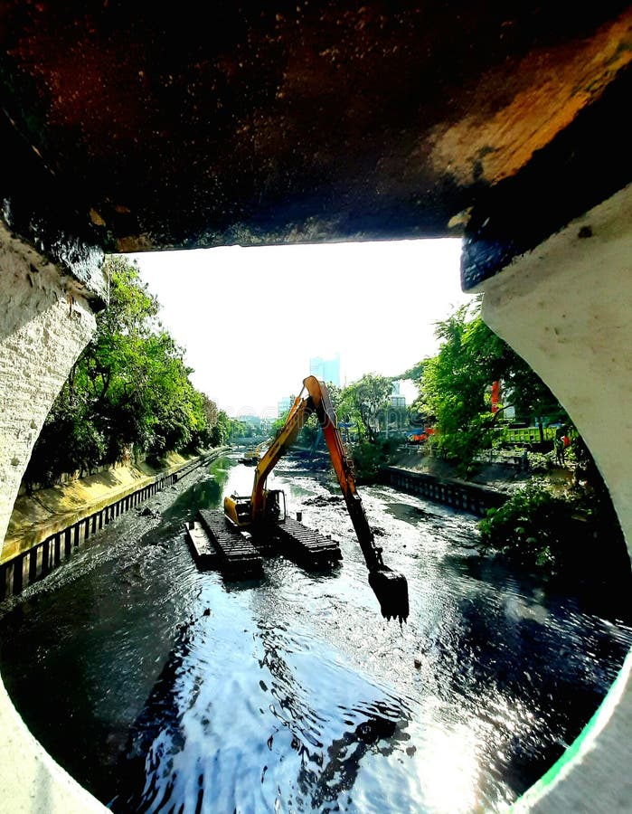 Tractor Cleaning River Stream Stock Image - Image of cleaning, vehicle ...