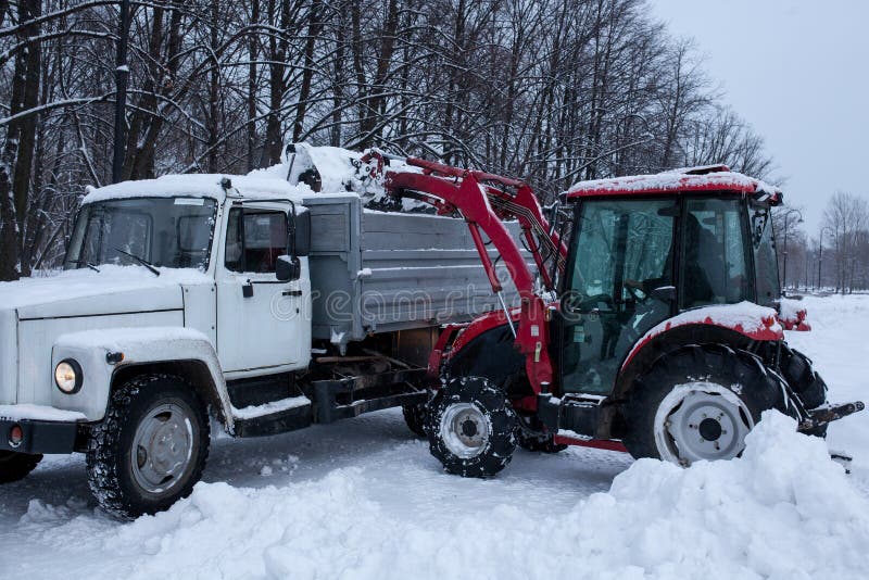 Tractor cleaning snow stock photo. Image of machine - 178235186