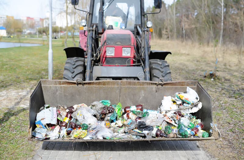 Tractor Cleaning Up the Street from Garbage Editorial Photo - Image of ...