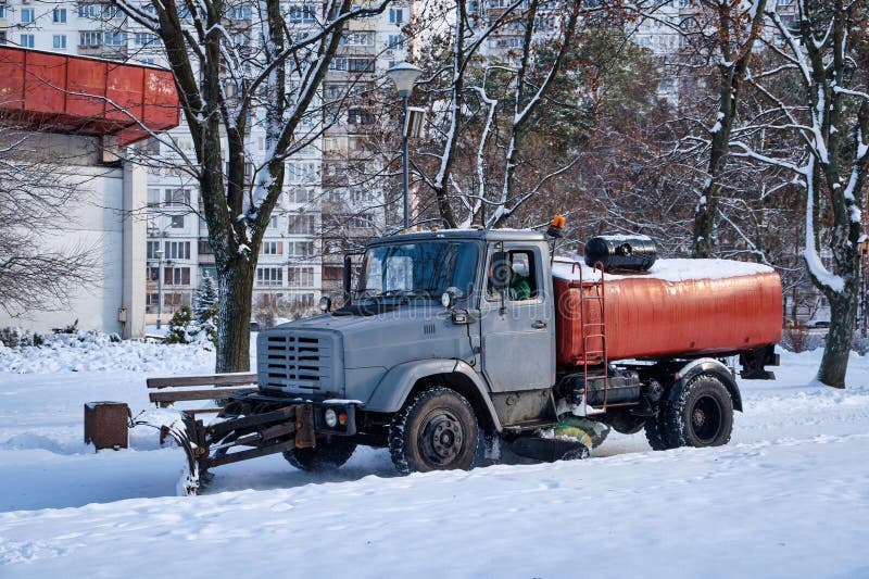 Tractor Clears the Way after Heavy Snowfall Stock Photo - Image of ...