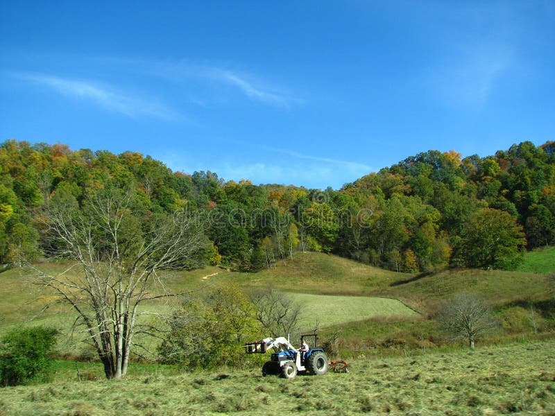 Tractor in countryside stock photo. Image of scenic, summer - 11517620