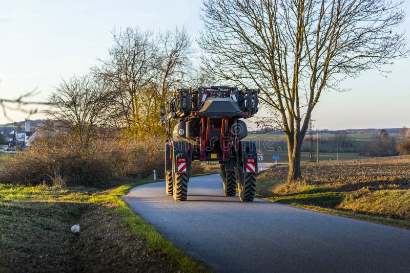 Tractor on the rural road stock photo. Image of fair - 131837172