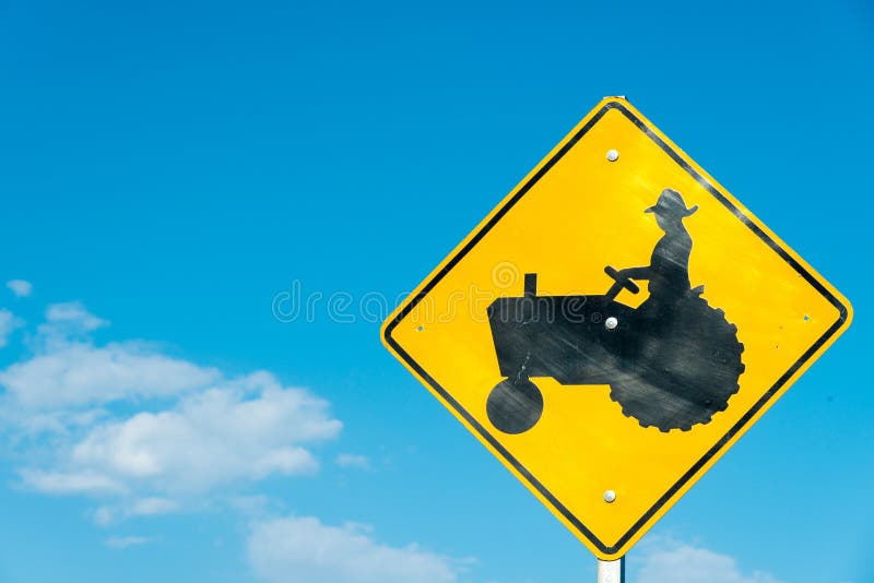 Tractor Crossing Sign stock photo. Image of street, warning - 31716874