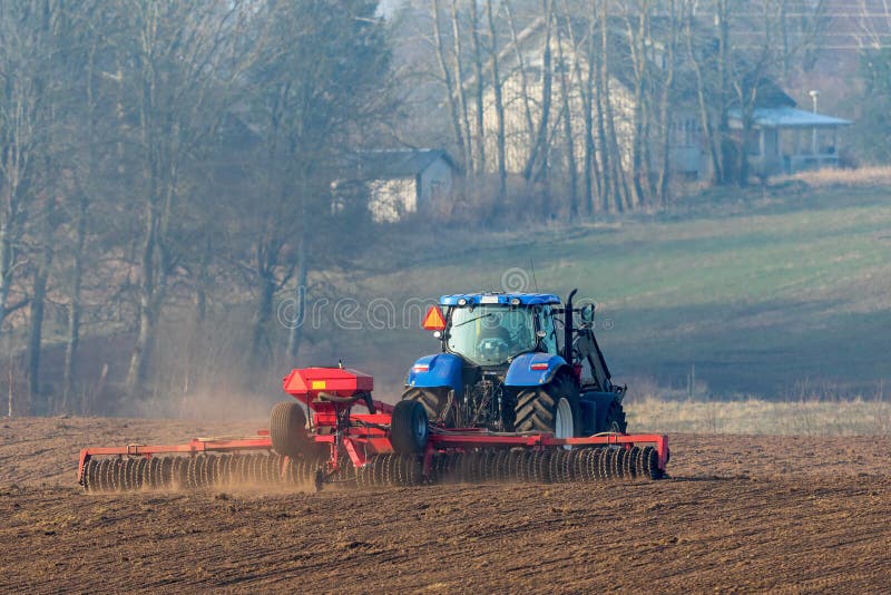 Tractor with a Cultipacker Rollers on the Field at Spring Stock Image ...