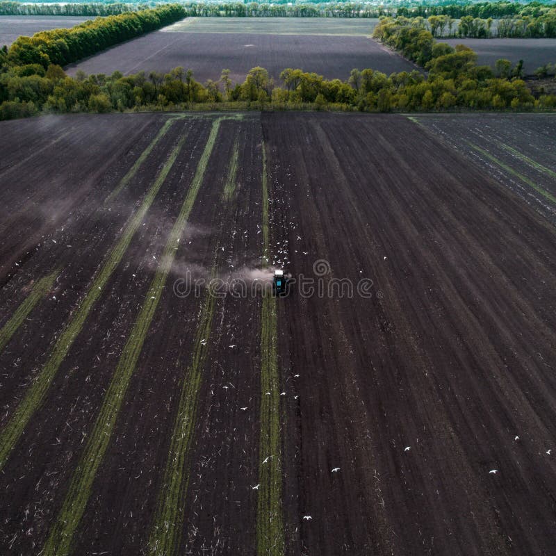 Tractor Cultivating Field at Spring,aerial View Stock Photo - Image of ...