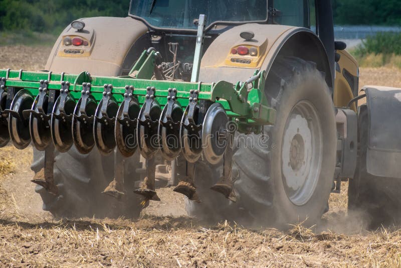 Tractor Cultivating the Field Stock Image - Image of arable ...