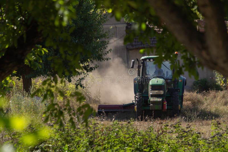 163 Tractor Cutting Dry Grass Stock Photos - Free & Royalty-Free Stock ...