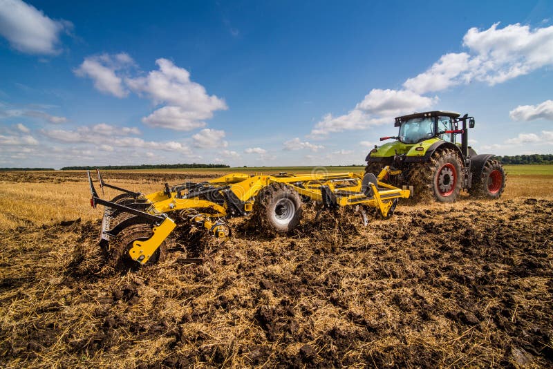 Disc Cultivator, Tillage System in Operation with Tractor Stock Image ...