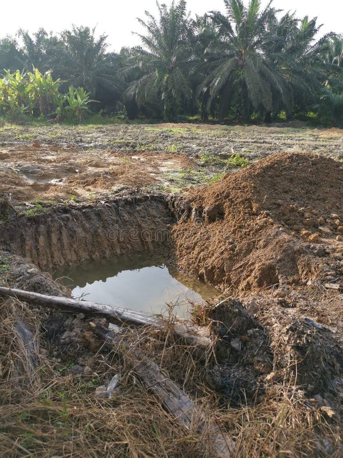 Tractor Dug Ditch Filled with Rain Water on the Land Stock Image ...