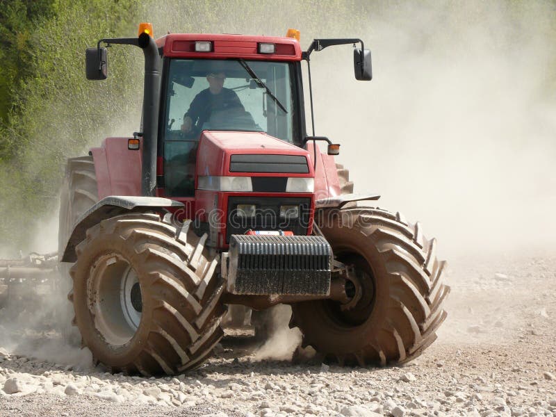 Tractor in the dust editorial photography. Image of agricultural - 80380202