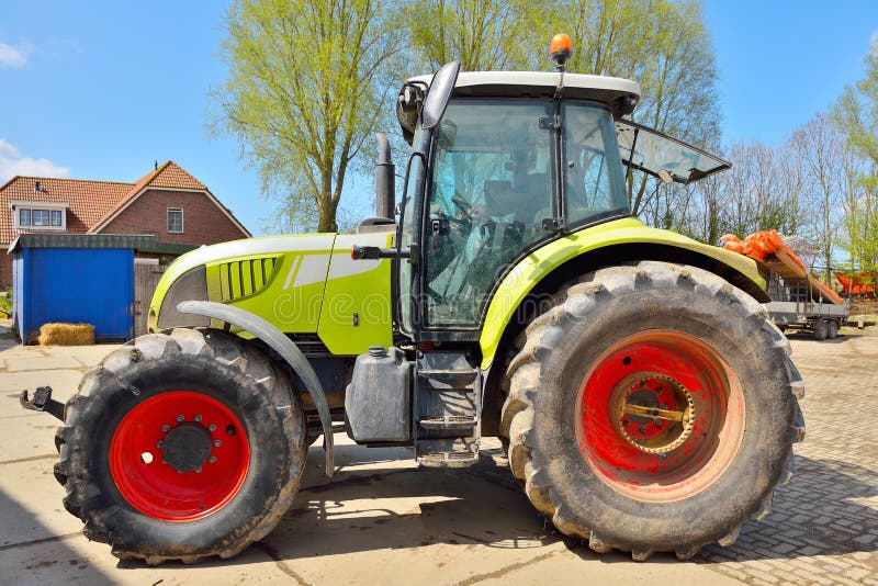 Tractor at farm stock photo. Image of farm, agribusiness - 30801144