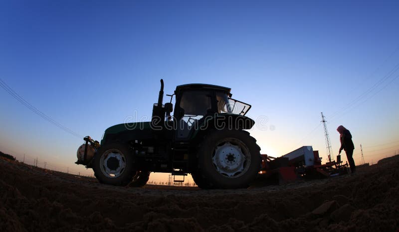 The Tractor in Farmland Farming Editorial Stock Image - Image of ...