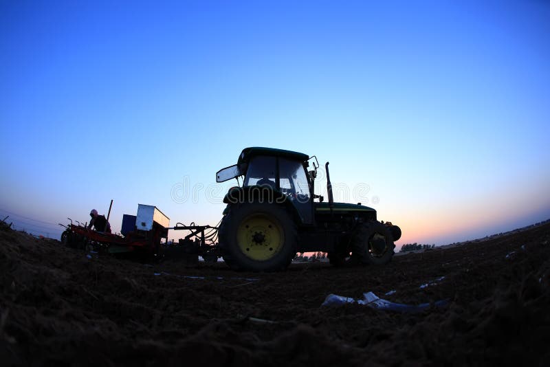The Tractor in Farmland Farming Stock Photo - Image of work, farm ...