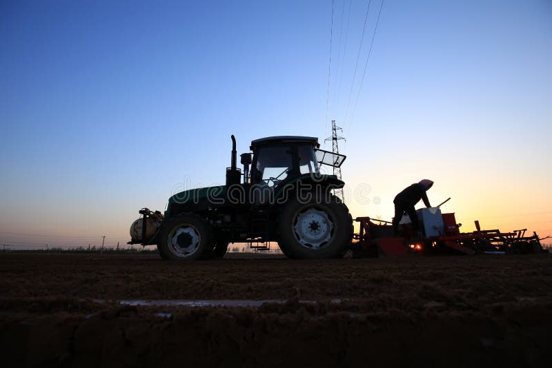 The Tractor in Farmland Farming Stock Image - Image of plowed, outdoors ...