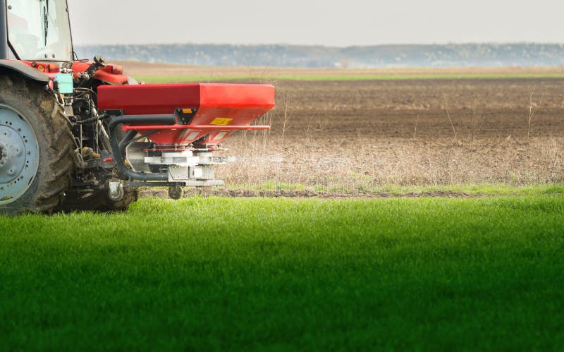 Tractor Fertilizing in Field Stock Image - Image of farm, driving: 68756325