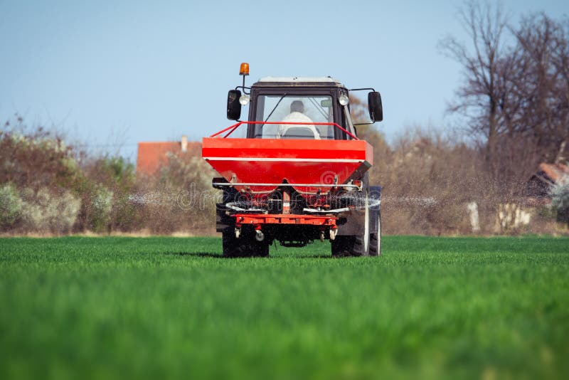Tractor Fertilizing Farm stock image. Image of agriculture - 8278921