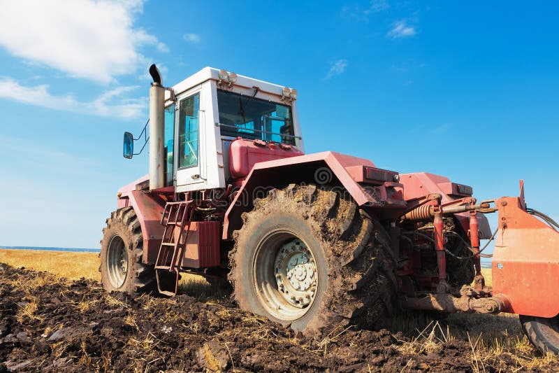 Tractor on the field stock image. Image of driving, machine - 26553477
