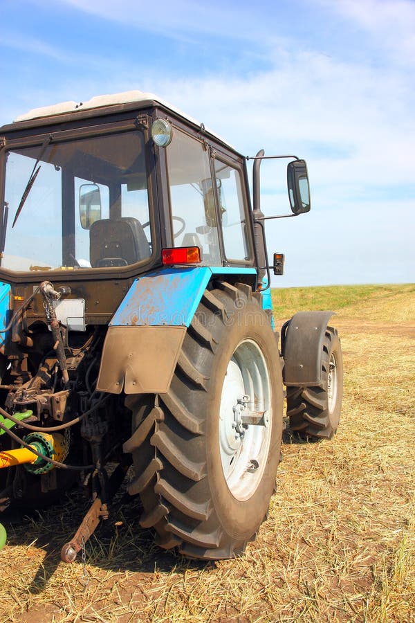 Tractor in a Field, Agricultural Scene in Summer Stock Image - Image of ...