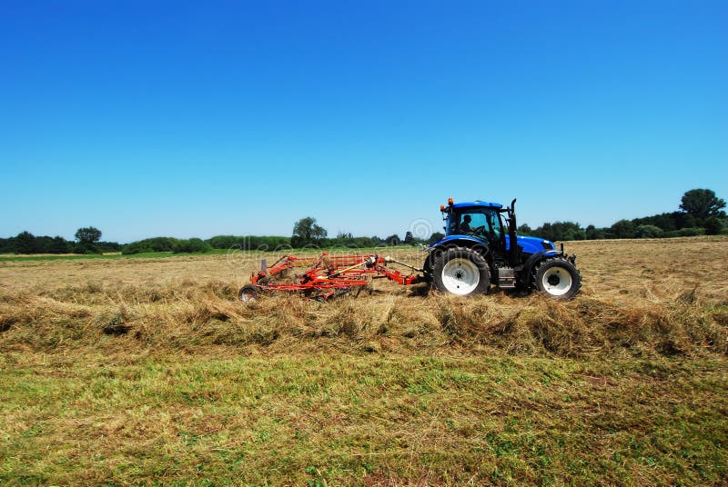 Tractor on field stock photo. Image of plow, village - 35203952