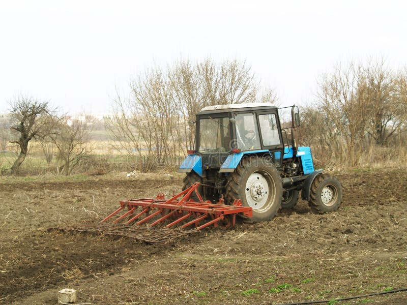 Tractor in a field stock image. Image of handling, work - 91116333