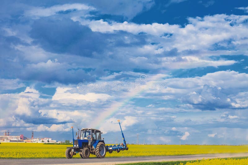 Tractor on the Field. Tractor Rides Near the Field Stock Image - Image ...