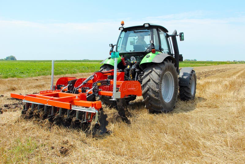 Farming Disks. Farm Tractor Preparing the Soil Stock Photo - Image of ...
