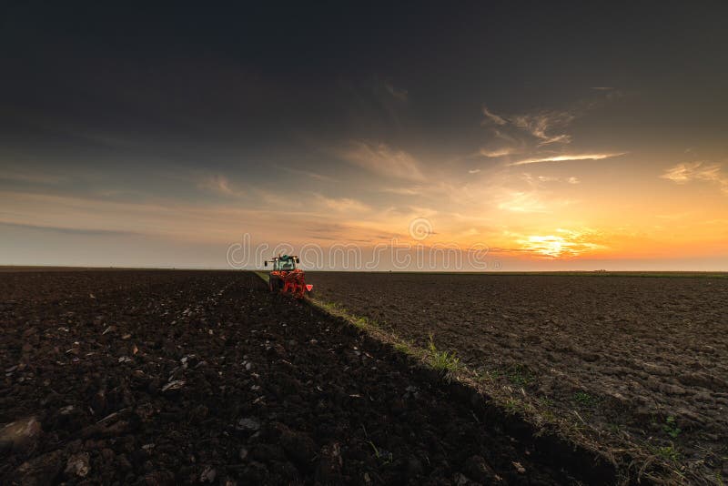 Tractor on the Field during Sunset Stock Image - Image of machinery ...