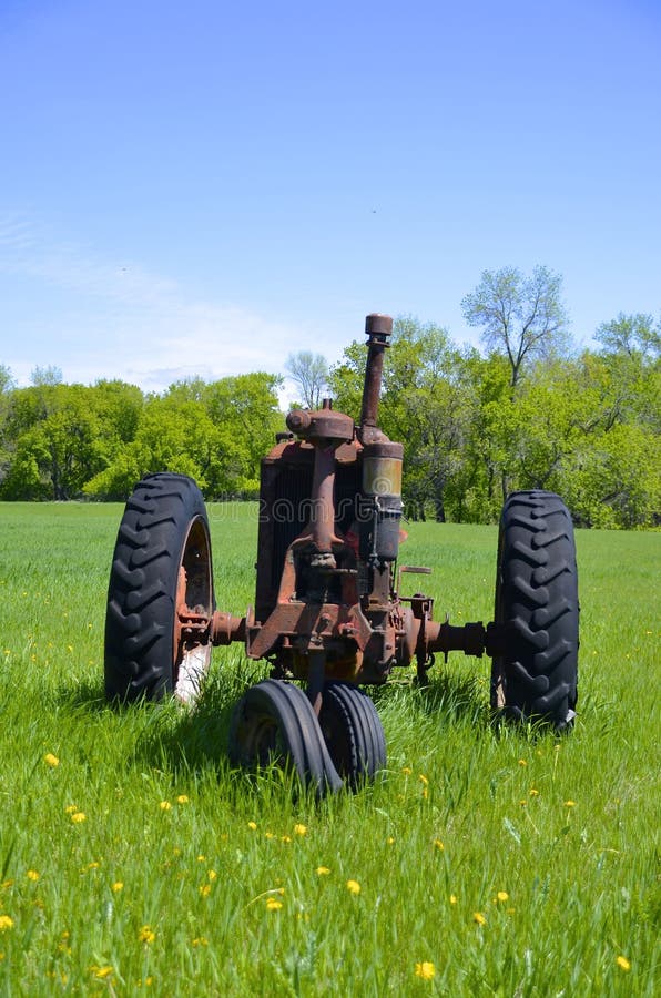Old Tractor with Front End Loader Stock Photo - Image of loader, garage ...