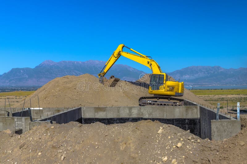 Tractor in Front of Utah Valley Mountains Stock Image - Image of wall ...