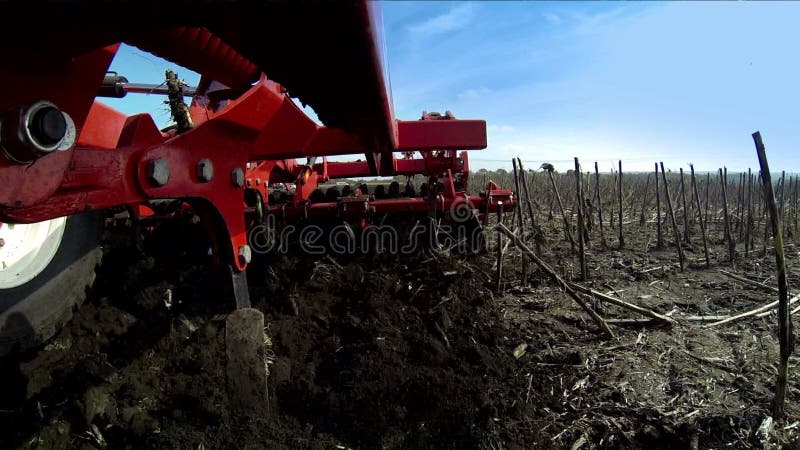 Processing the Field with a Red Tractor, Cultivation before Planting ...