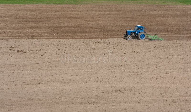 Tractor Harrowed Field stock image. Image of field, soil - 80889653