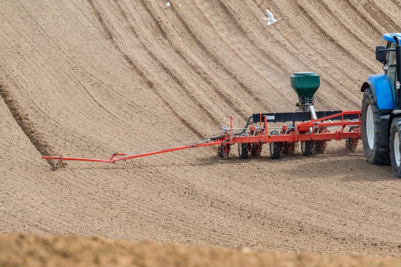 Tractor Harrowing the Field Stock Photo - Image of growth, industry ...