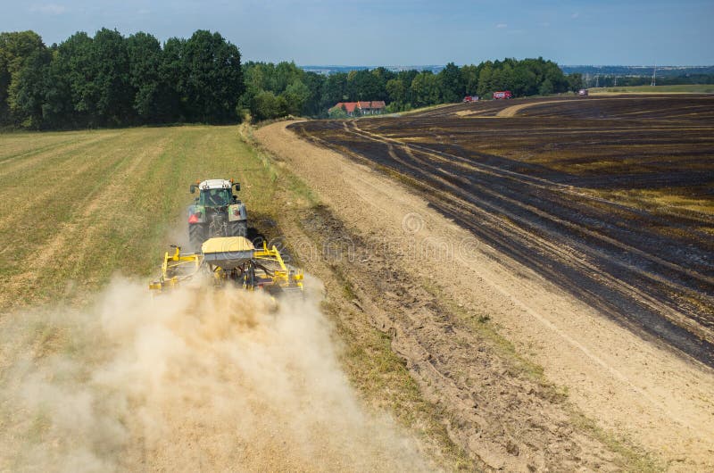 Tractor Harrowing the Field in Fire Stock Image - Image of farm, fire ...