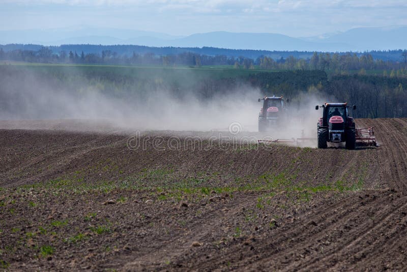 Tractor Harrowing the Field Stock Image - Image of plain, growth: 54092501