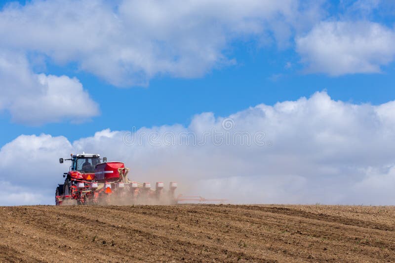Tractor Harrowing the Field Stock Photo - Image of cultivation ...