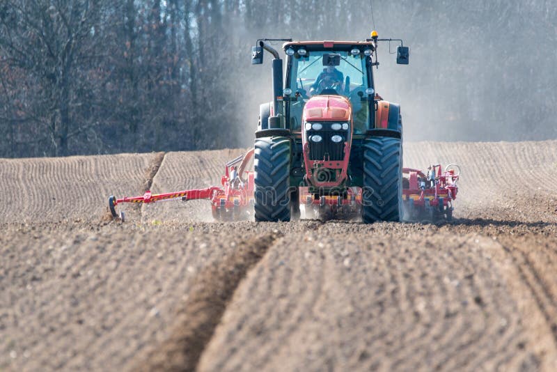 Tractor Harrowing the Field Stock Image - Image of agronomy, nature ...