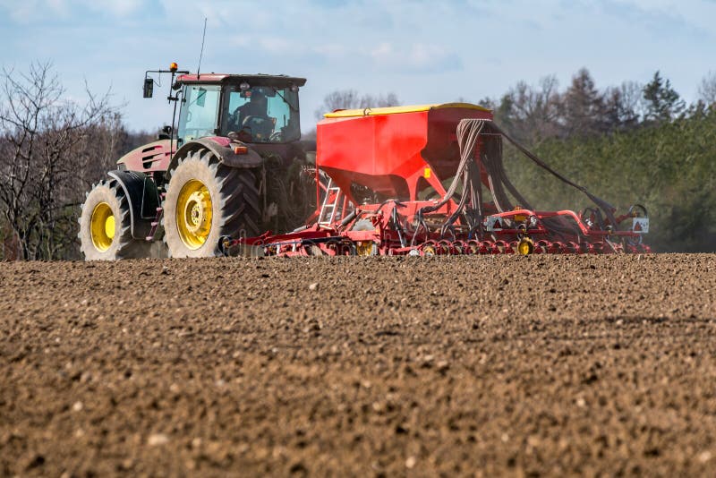 Tractor Harrowing the Field Stock Photo - Image of cultivation, drive ...