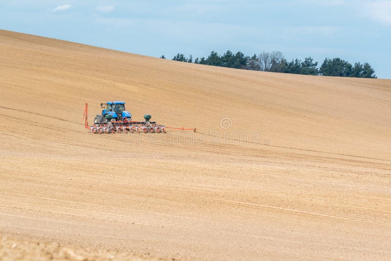 Tractor Harrowing the Field Stock Image - Image of outdoors, fieldwork ...