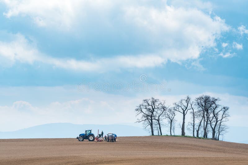 Tractor Harrowing the Field Stock Photo - Image of agriculture, earth ...