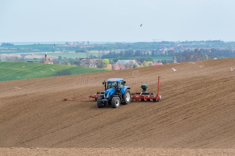 Tractor Harrowing the Field Stock Photo - Image of field, country: 81351024