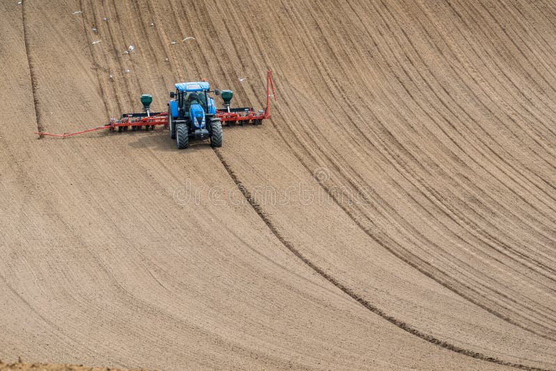 Tractor Harrowing the Field Stock Image - Image of environment, green ...