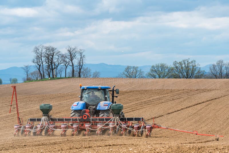 Tractor Harrowing the Field Stock Image - Image of arable, country ...
