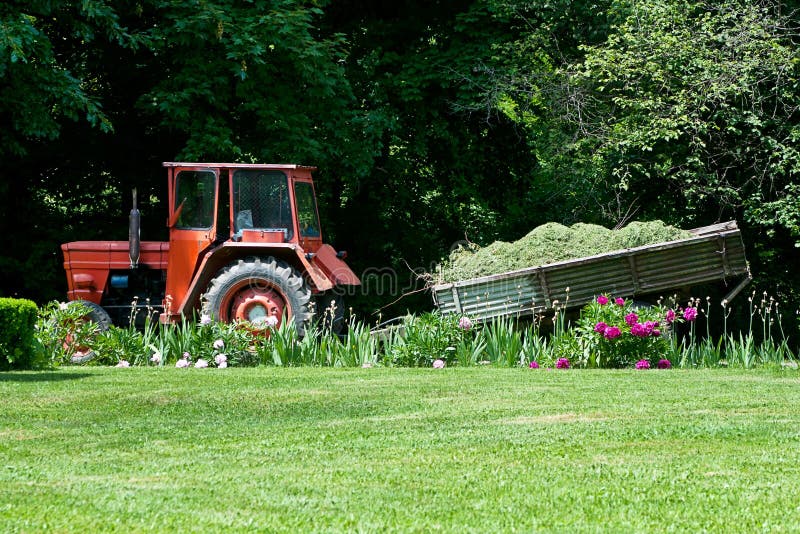 Tractor with hay stock photo. Image of exterior, cleaning - 20512090